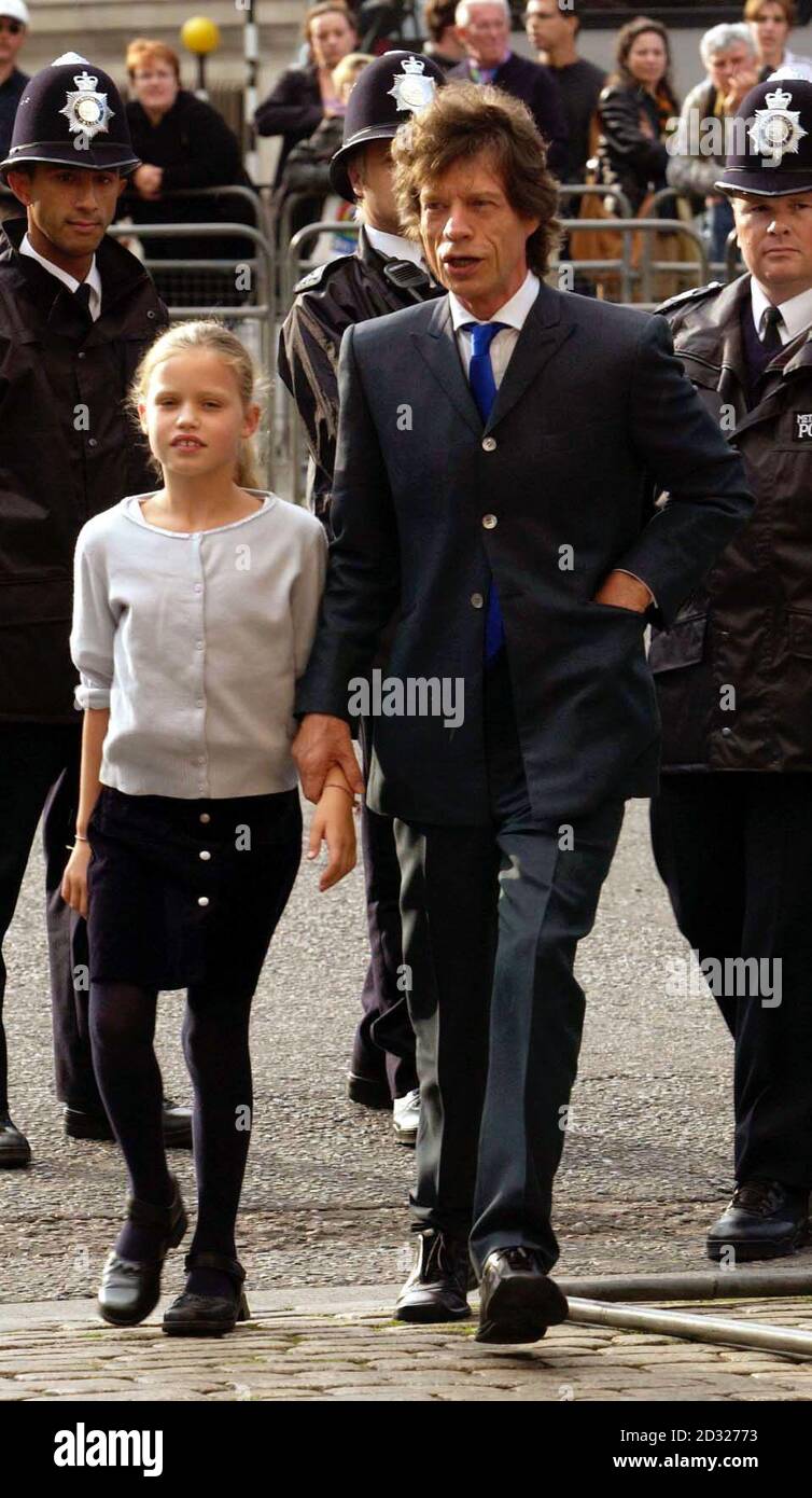 Mick Jagger arrives with his daughter Georgia at Westminster Abbey ...