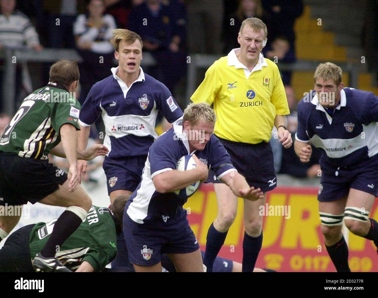 Bristol's Ben Sturnham (centre) is pulled down during the Rugby Union ...