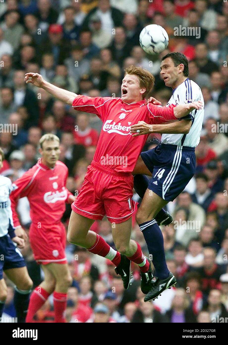 Liverpools john arne riise jumps up hi-res stock photography and images ...