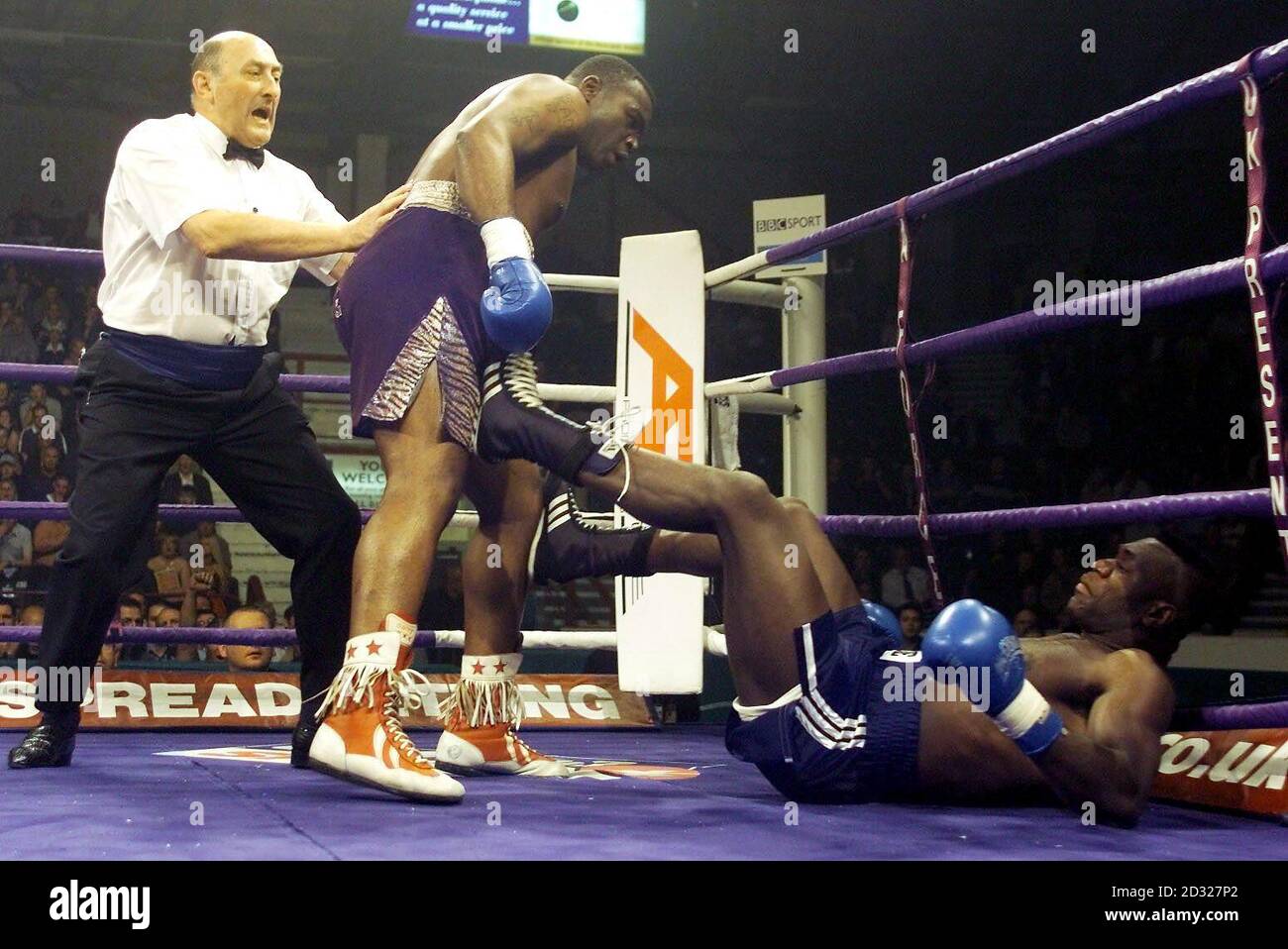 Great Britain's Herbie Hide (right) is knocked down by Zambia's Joseph ...