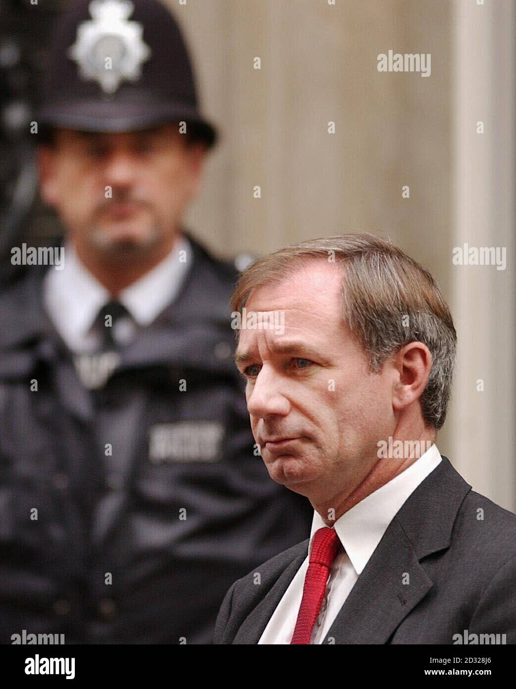 Defence Secretary Geoff Hoon leaves Downing Street, following both ...