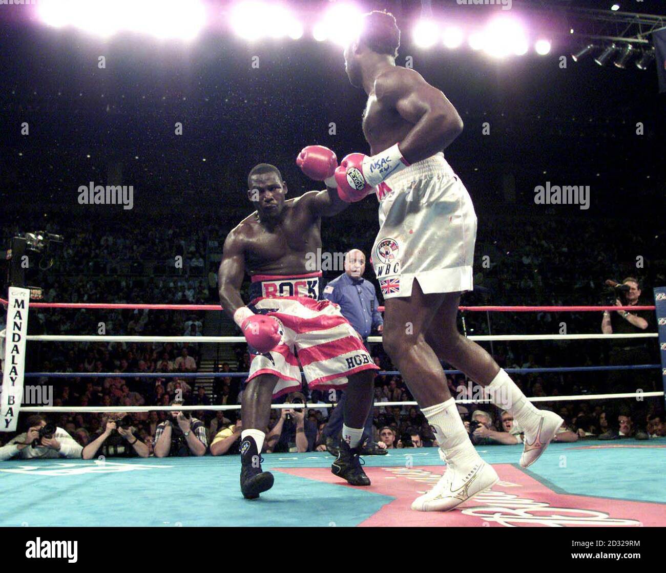 Great Britain's Lennox Lewis knocks out USA's Hasim Rahman during the ...