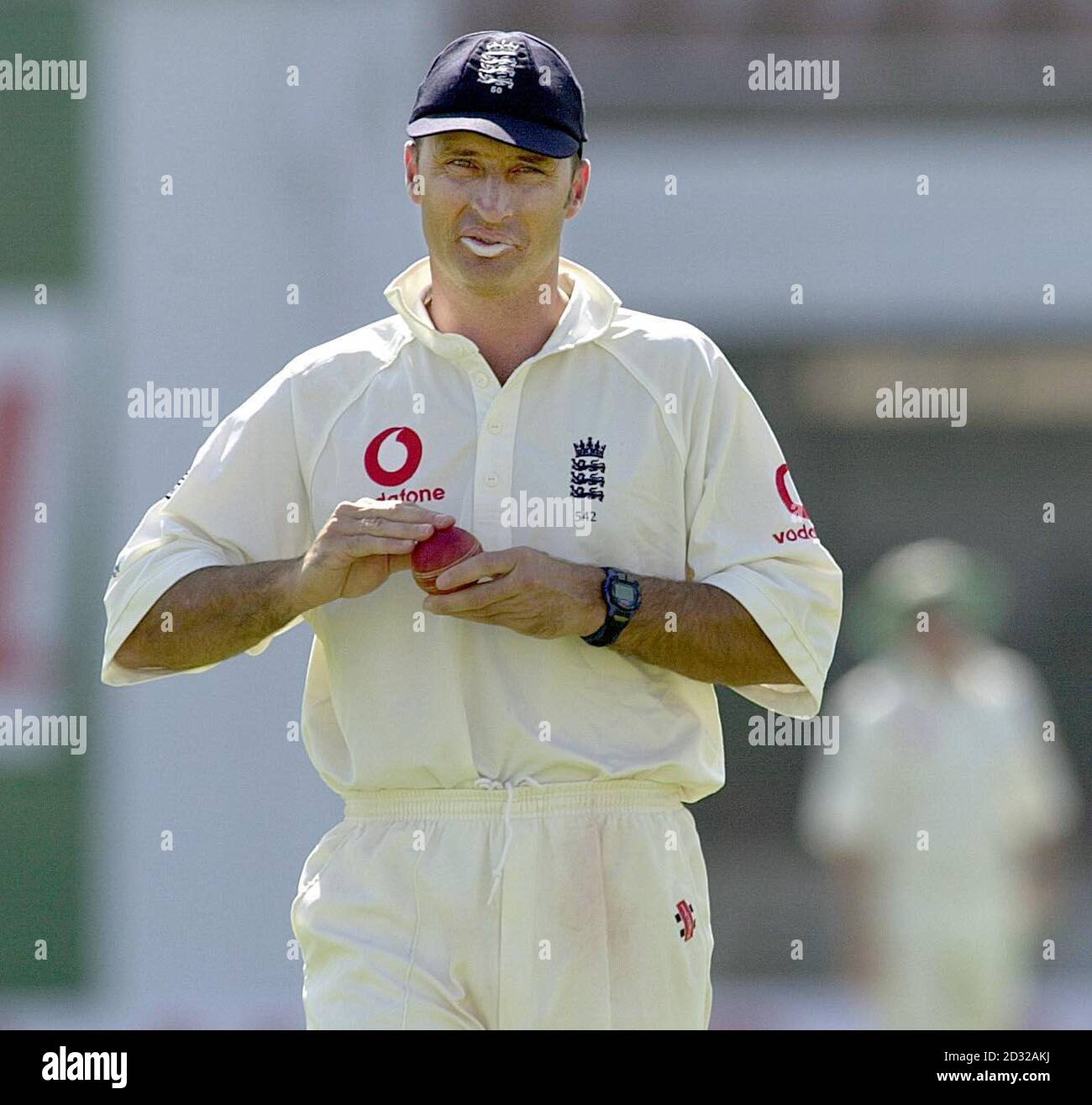 England captain Nasser Hussain shines the ball, during the Second Test ...