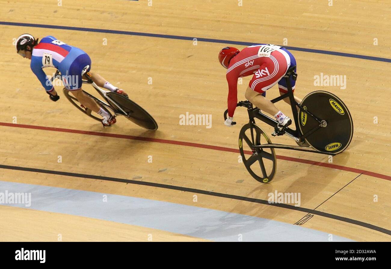 The tyre of Great Britain's Philip Hindes (right) comes off in his ...