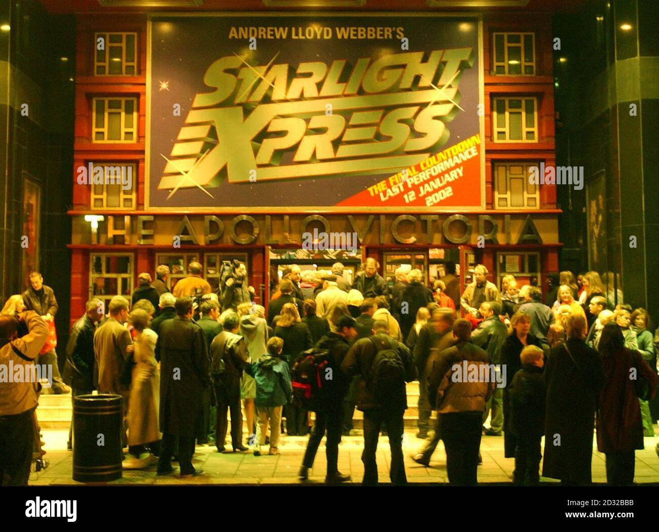 Crowds gather outside the Victoria Apollo Theatre in central London ...