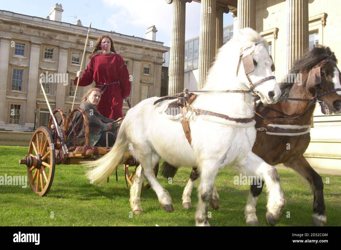A replica chariot is driven around the forecourt of the British Museum ...