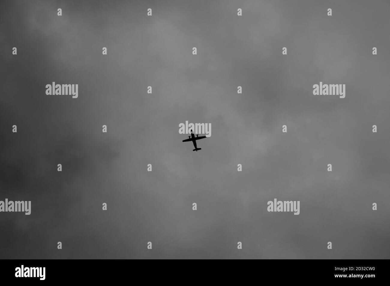 Blue sky and plane Black and White Stock Photos & Images - Alamy