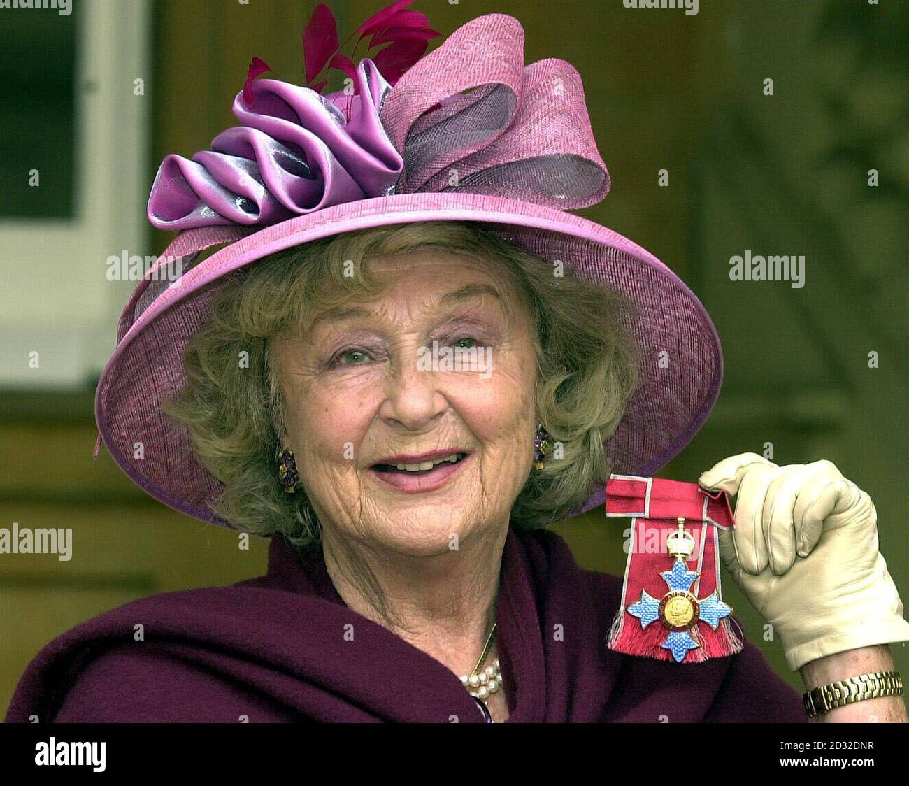 Actress Googie Withers after receiving her CBE from Queen Elizabeth II ...