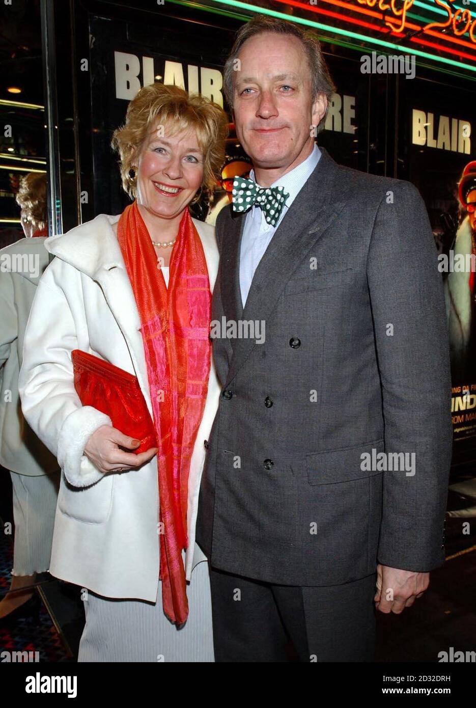 Celebrity with wife arriving grey suit hi-res stock photography and ...