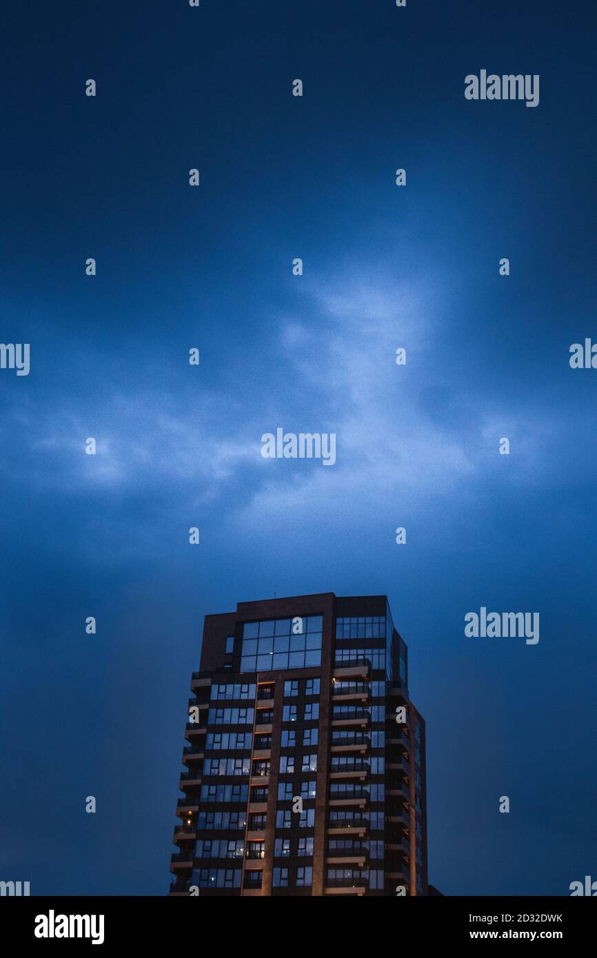Modern building, sky reflecting in the building Stock Photo - Alamy