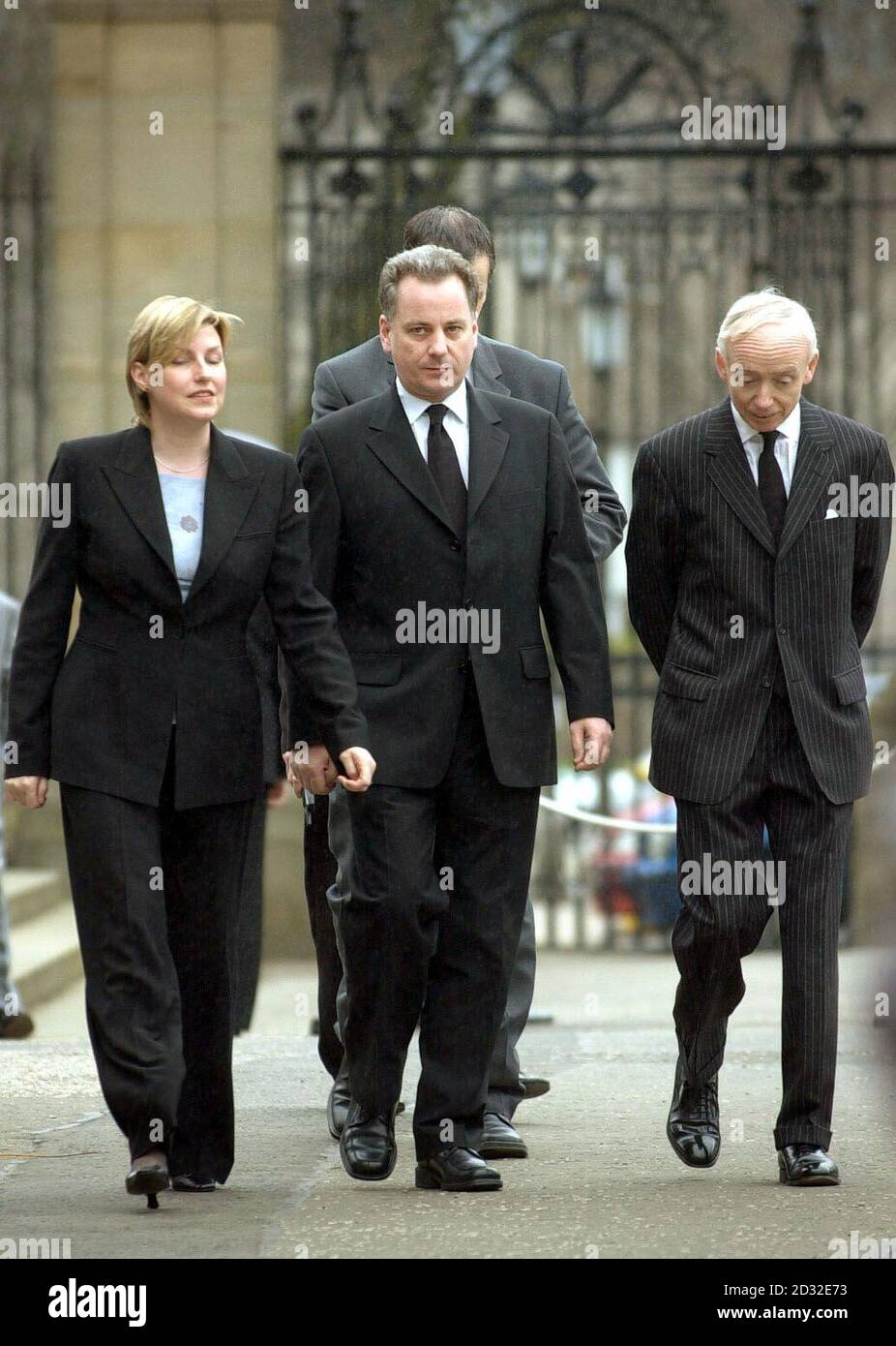 Scottish First Minister Jack McConnell (centre), accompanied by his ...