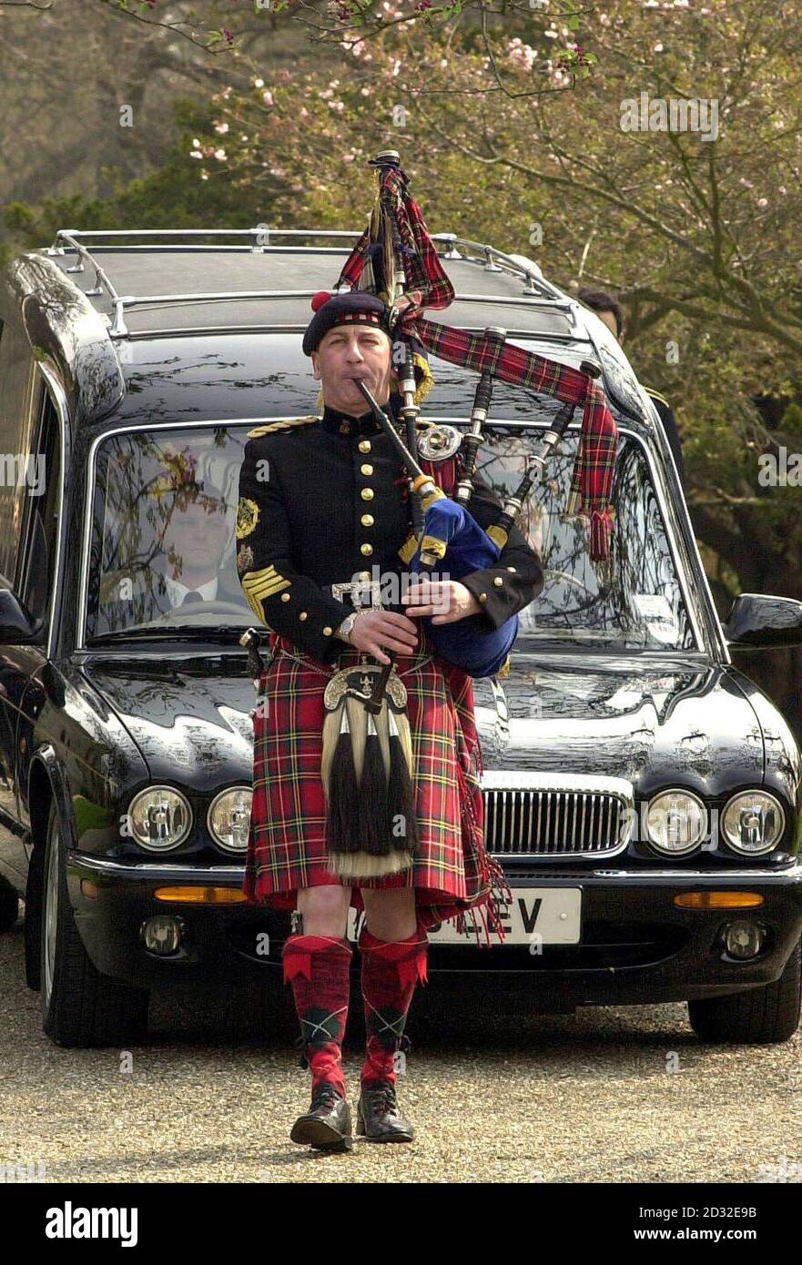 The Queen's piper Jim Motherwell plays ahead of the Queen Mother's ...