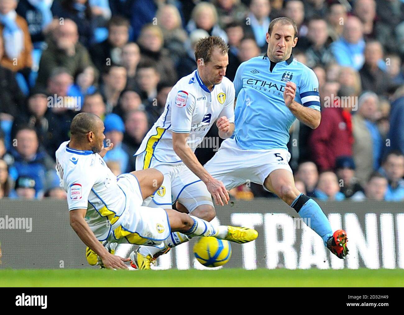 Leeds United's Rodolph Austin (left) and Luke Varney in action with ...