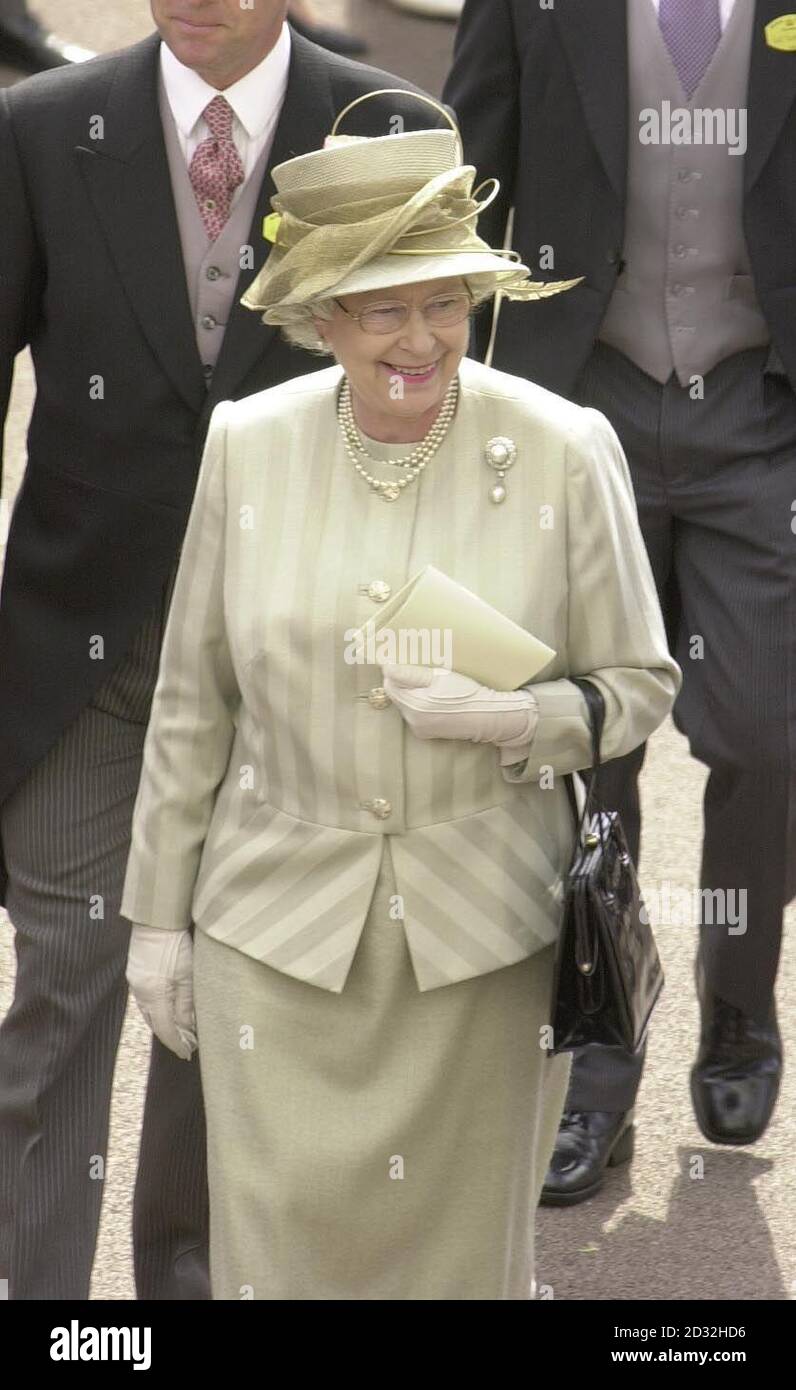 Britain's Queen Elizabeth II walks through the Royal enclosure at Ascot ...