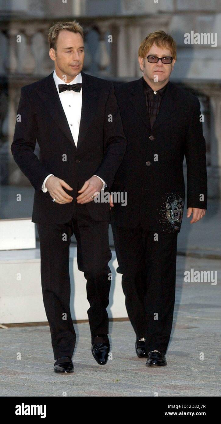 Celebrity suit sunglasses hi-res stock photography and images - Alamy