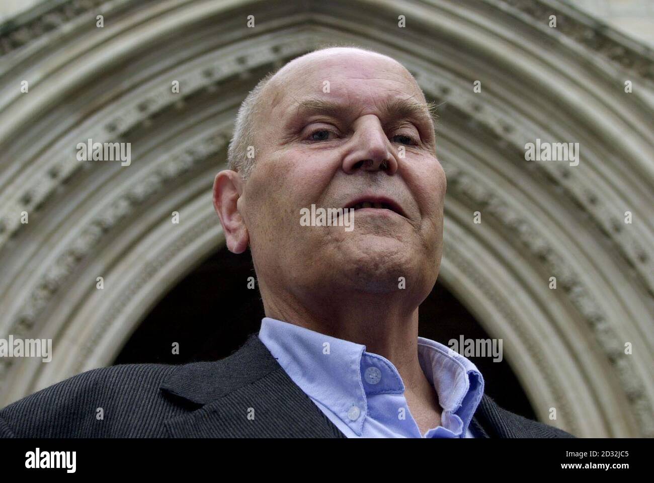 Bob Maynard grins outside the Royal Courts of Justice in central London ...
