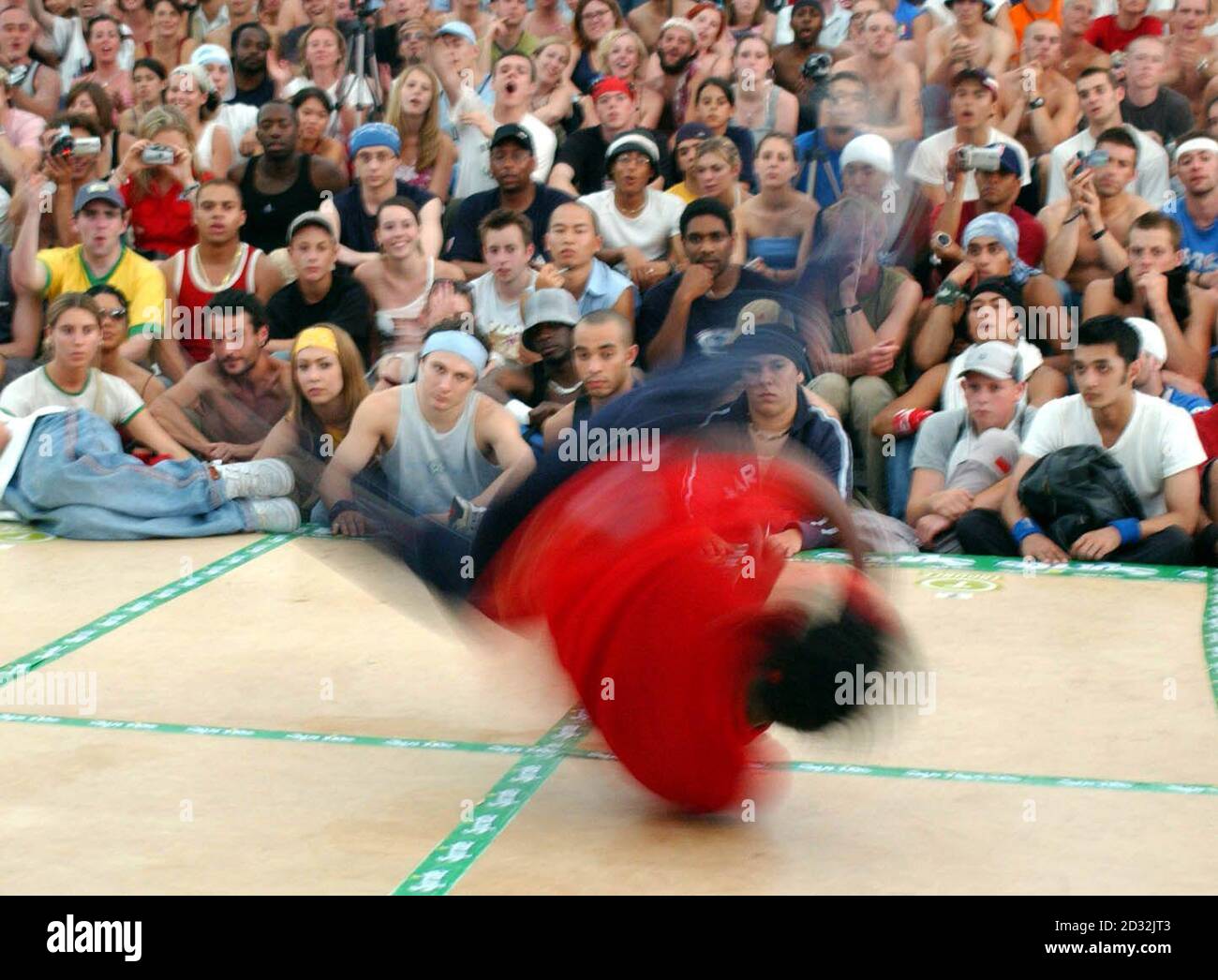 A break dancer performs at the Sprite Urban Games 2002, on Clapham ...