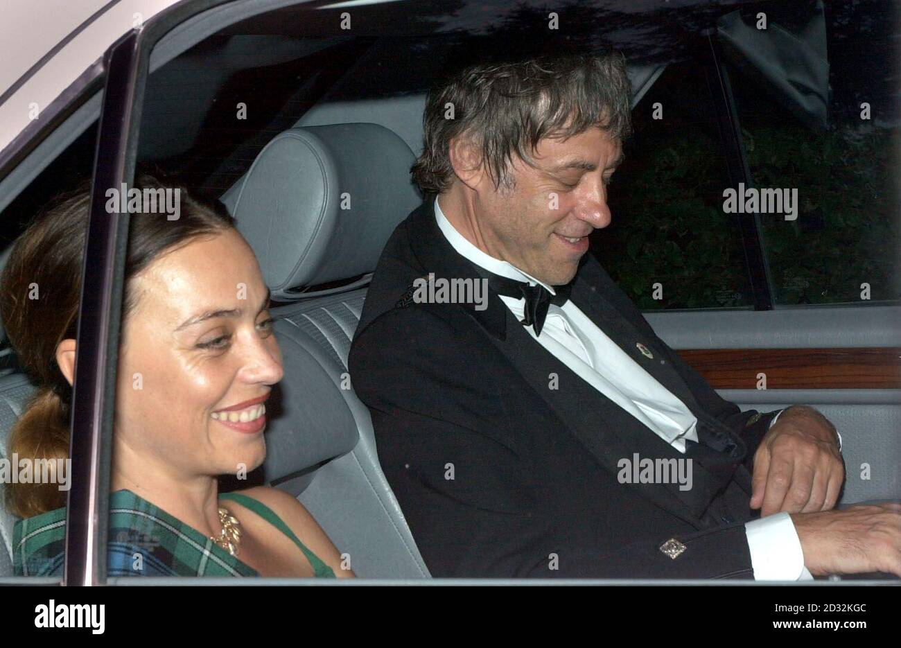 British rock singer Sir Bob Geldof arrives with his partner Jeanne ...