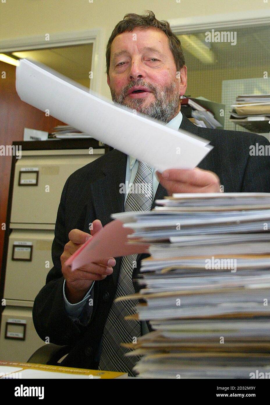 Home secretary david blunkett sits with pile of police paperwork hi-res ...