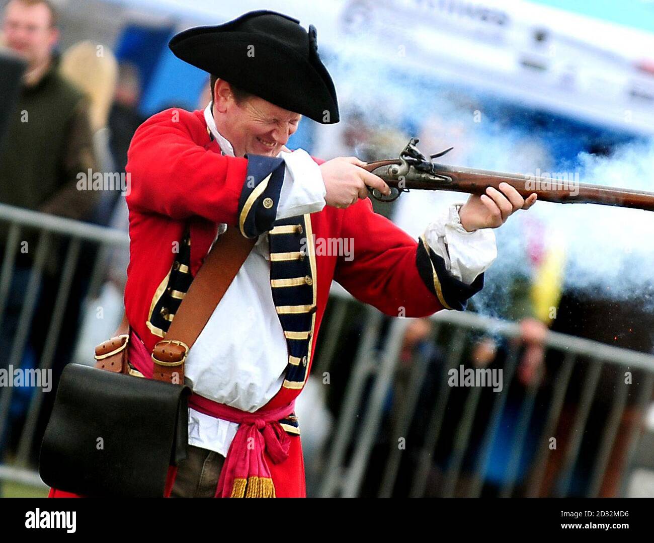 STANDALONE PHOTO. A man fires a rifle during a historic firearms ...
