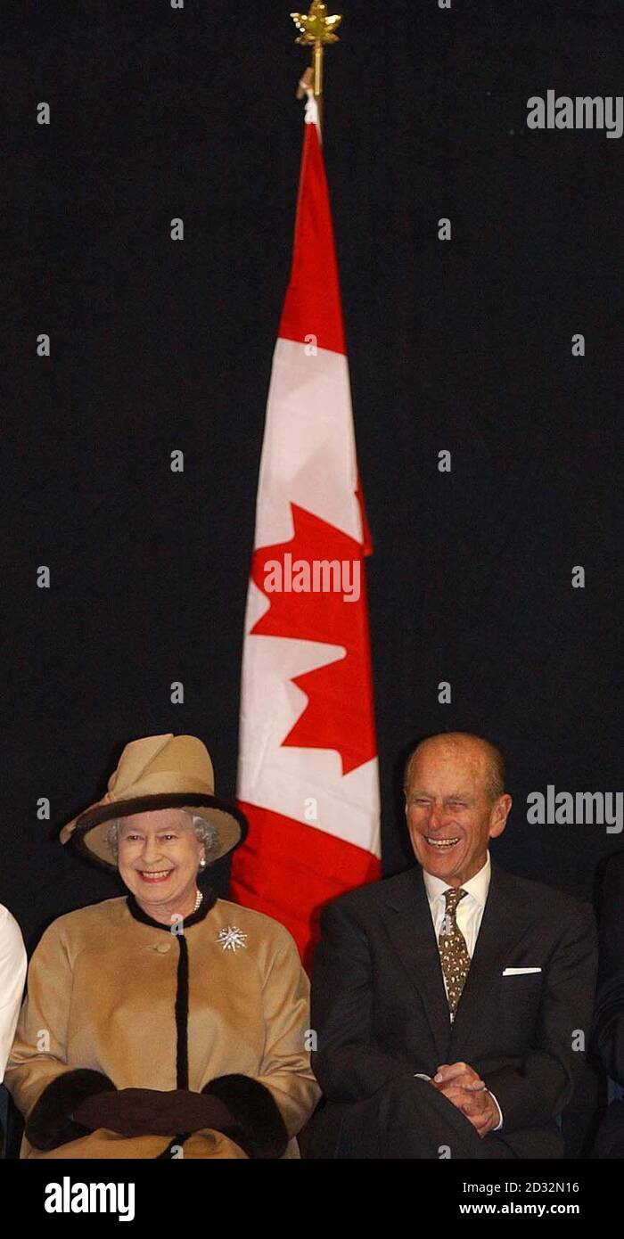 Queen Elizabeth II and her husband the Duke of Edinburgh, watch a ...