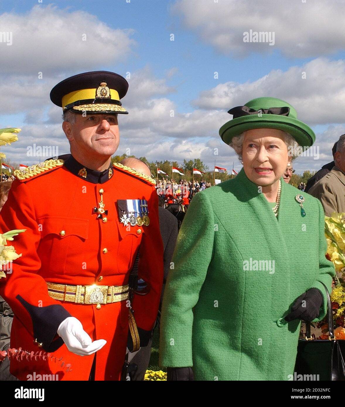 Britain's Queen Elizabeth II with the commissioner of the Royal ...