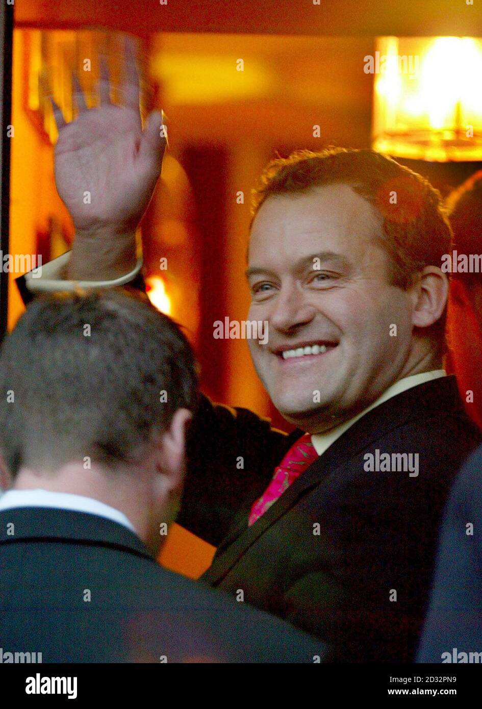 Former butler to Diana, Princess of Wales, Paul Burrell waves to the ...