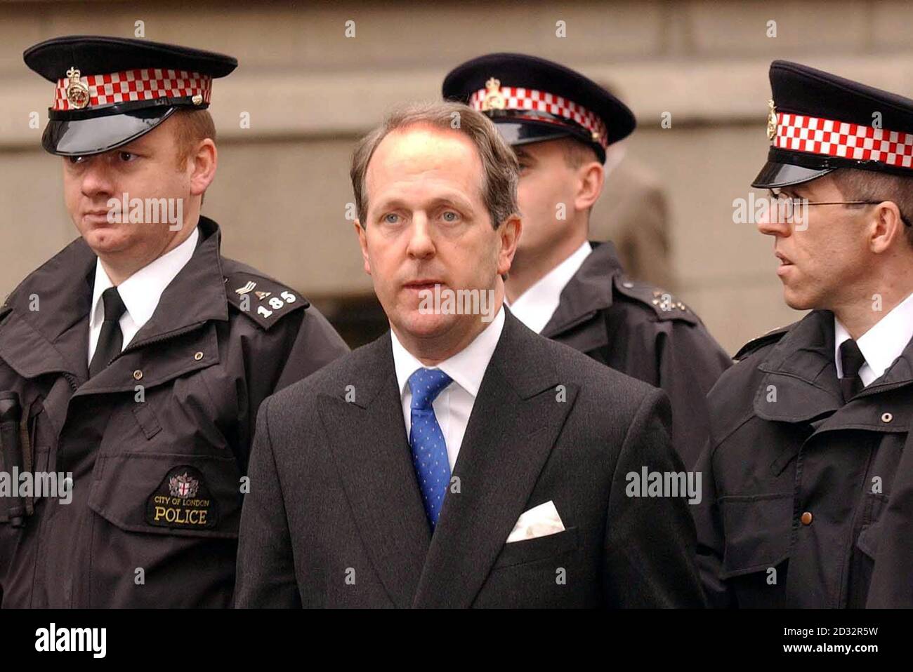 Harold Brown, former butler to Diana, Princess of Wales, is escorted by ...