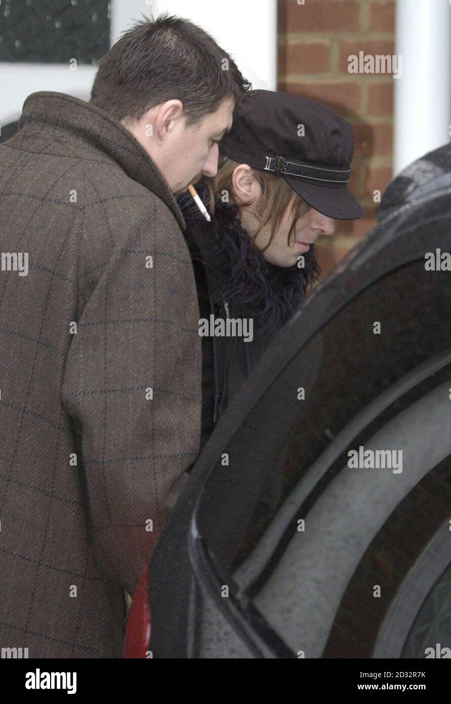 Liam Gallagher (right) leaving his north London home. The Oasis singer ...