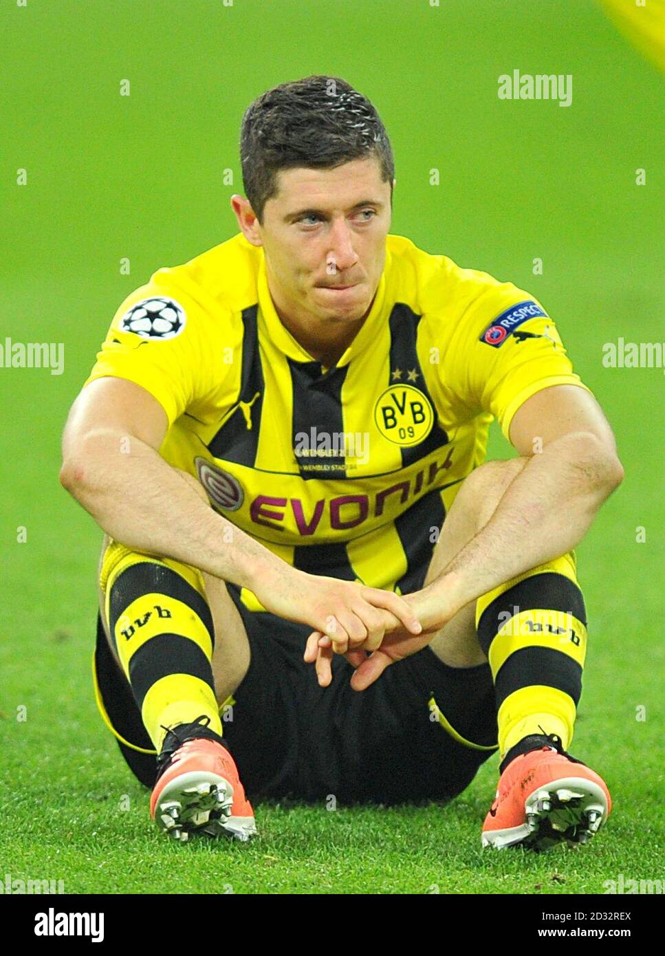 Borussia Dortmund's Robert Lewandowski looks dejected on the pitch as ...
