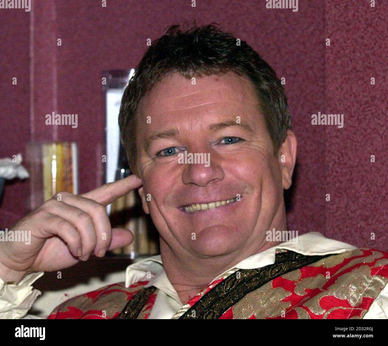 Comedien Jim Davidson relaxes between performances of Dick Whittington ...