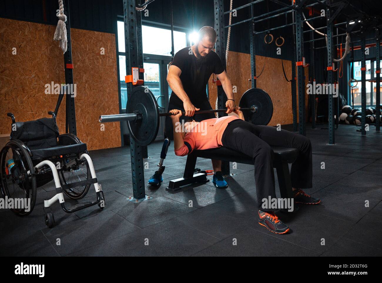 Weight. Disabled woman training in the gym of rehabilitation center ...