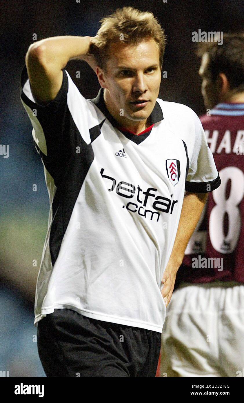 Football action arm raised hi-res stock photography and images - Alamy