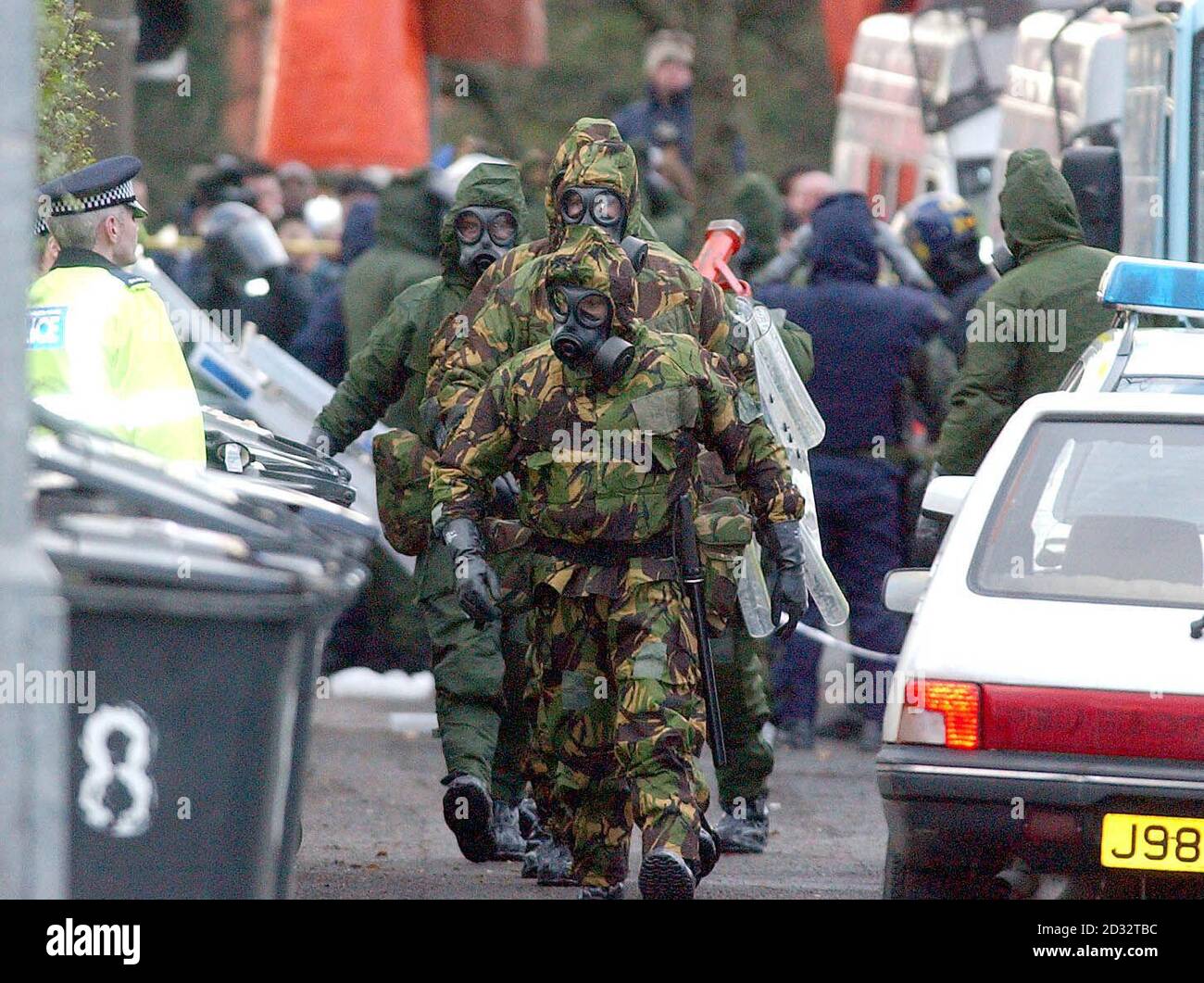 The Army march into the premises in the Crumpsall area of Manchester ...