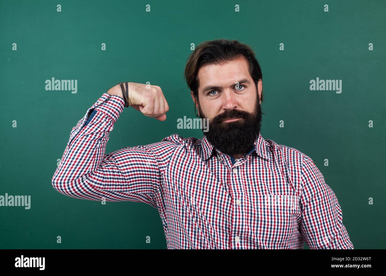 confident man showing biceps demonstrating power, male strength Stock ...