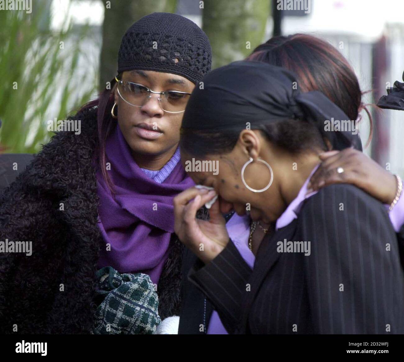 Sophie Ellis (left) arrives for the funeral of her sister Charlene ...