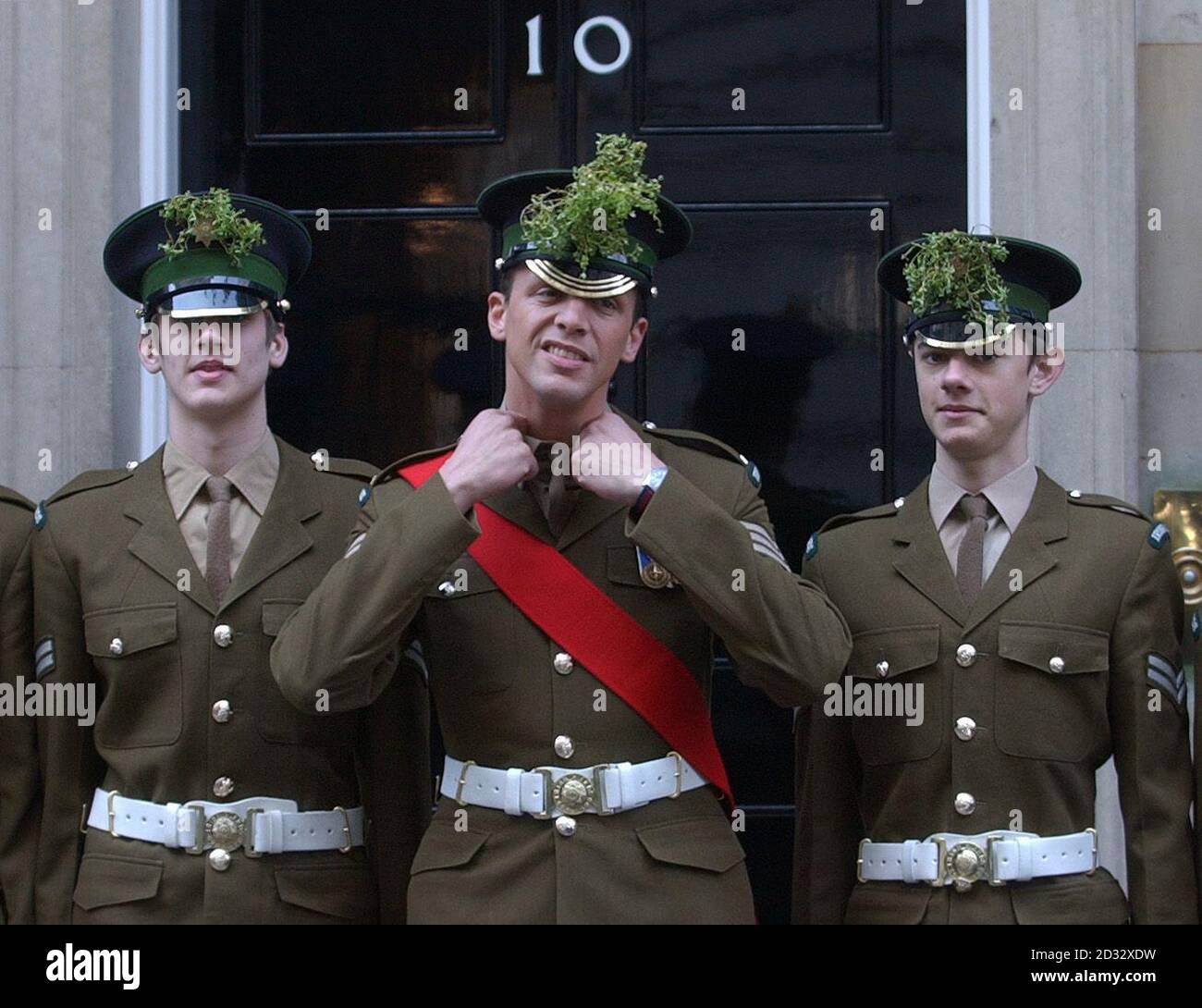 A Sergeant from the Irish Guards Army Cadet Force adjusts his tie ...