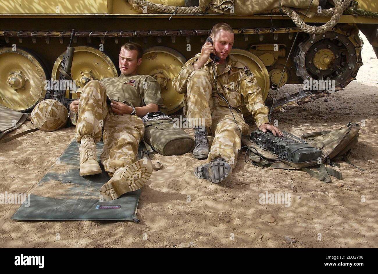 Lance Corp Horice Mark and trooper Paul Harris relax by their spartan ...