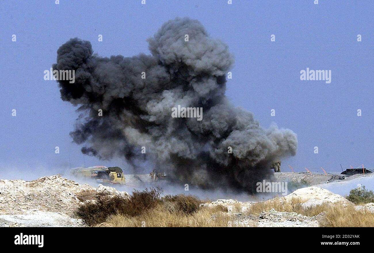 Royal engineers clear out Iraqi anti-tank mines around a bridge ...