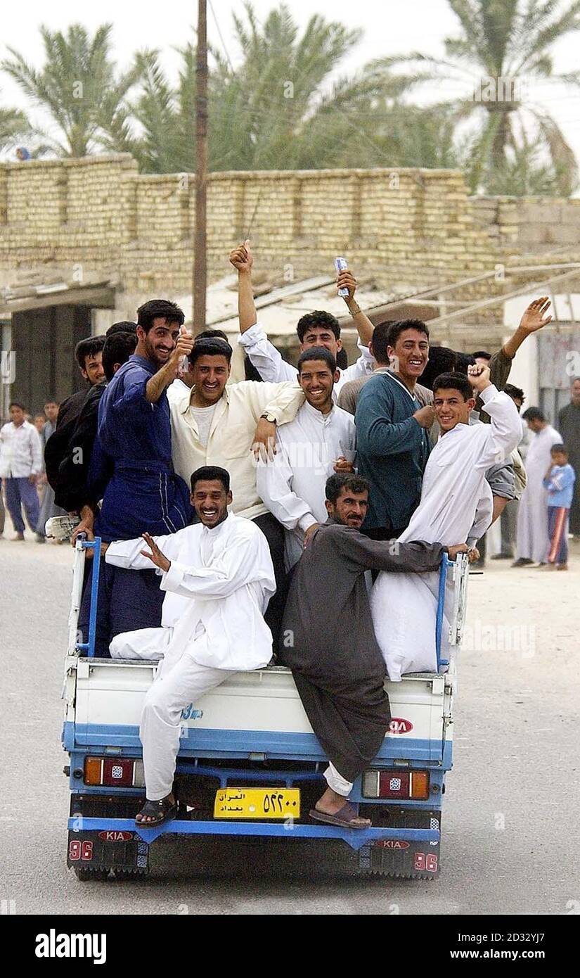 Local Iraqi's greet soldiers after the Household Cavalry Reg. and the ...