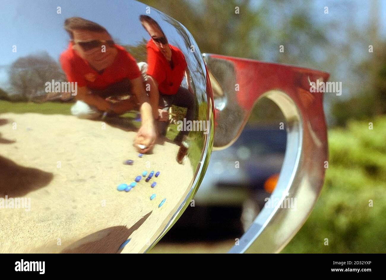 Playing marbles in a cup hi-res stock photography and images - Alamy