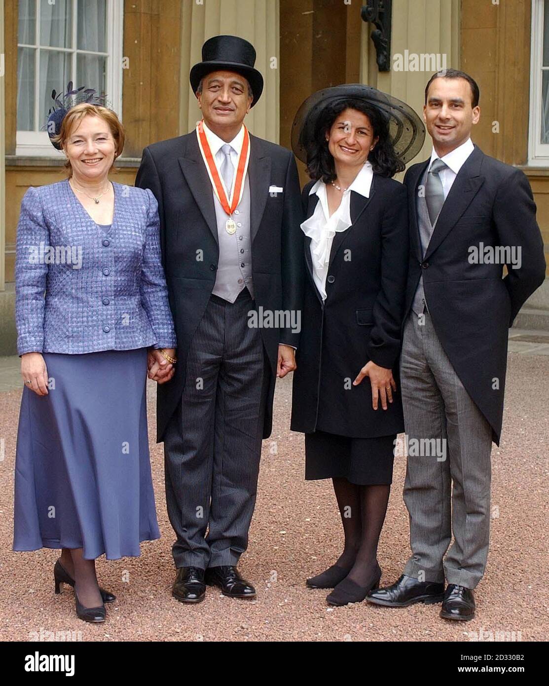 Professor Sir Ravinder Maini from south west London with his medal for ...