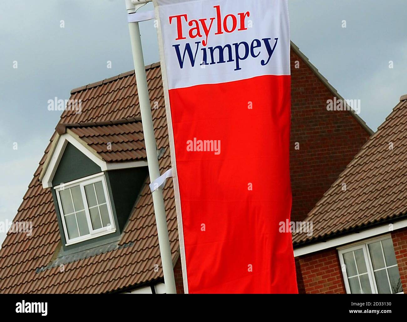 General view of Taylor Wimpey signs at a housing development in ...