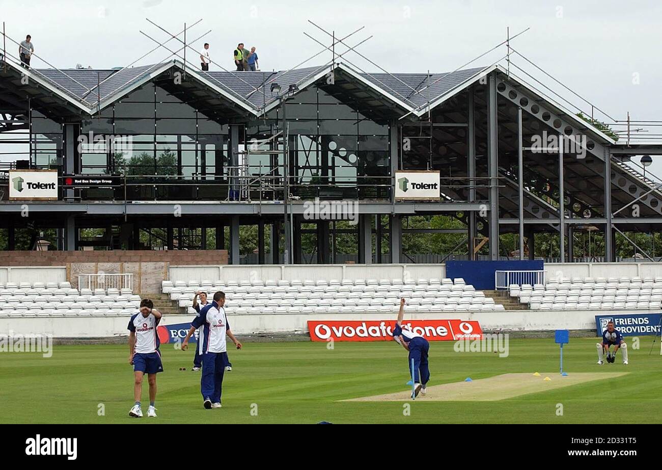 Watched by builders constructing a new stand, England train at the ...
