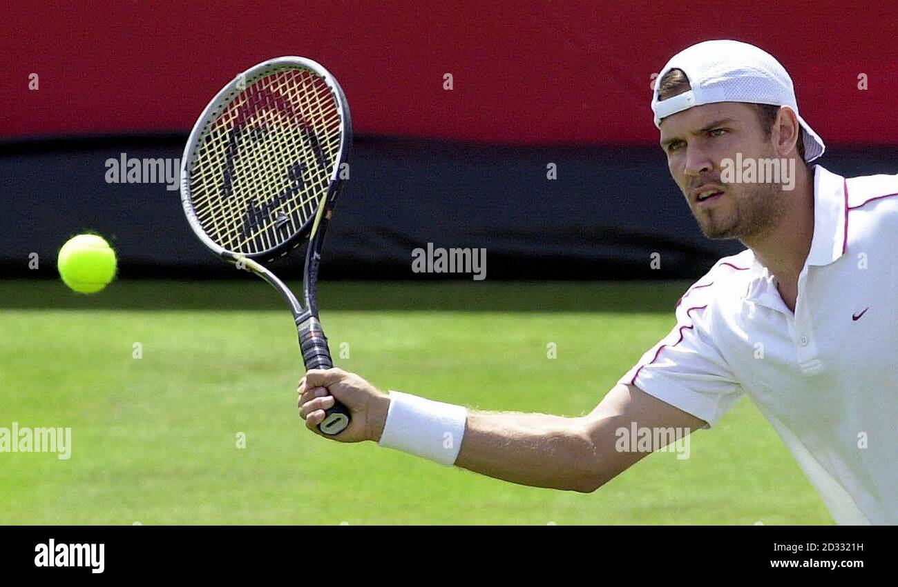 Germany's Alexander Waske in action against Italy's Davide Sanguinetti ...