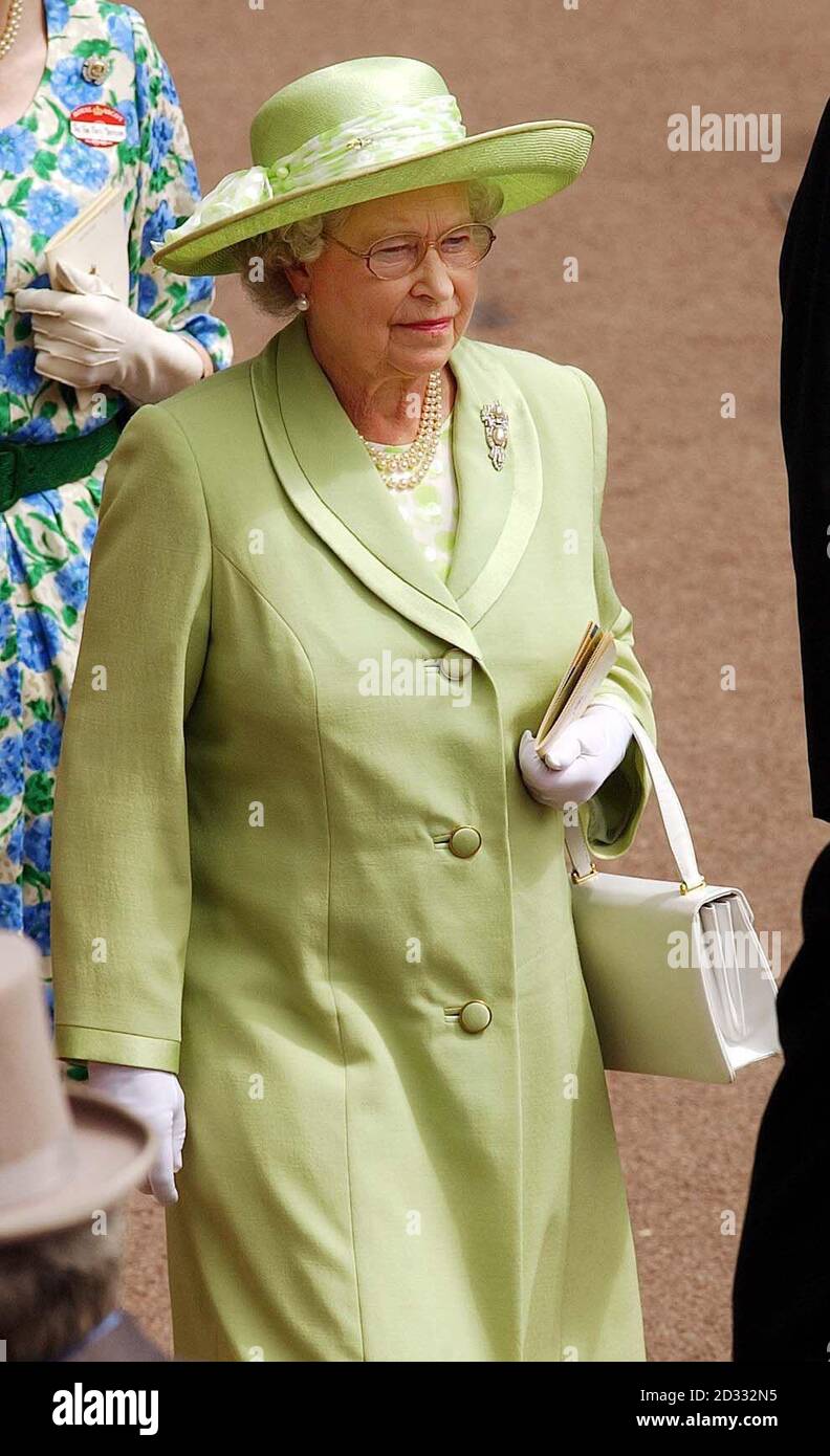 Britain's Queen Elizabeth II walks through the Royal enclosure at Ascot ...