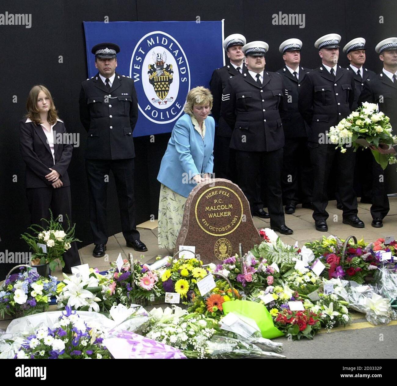 Mrs Helen Walker, widow of murdered policeman Malcolm Walker, pauses by ...