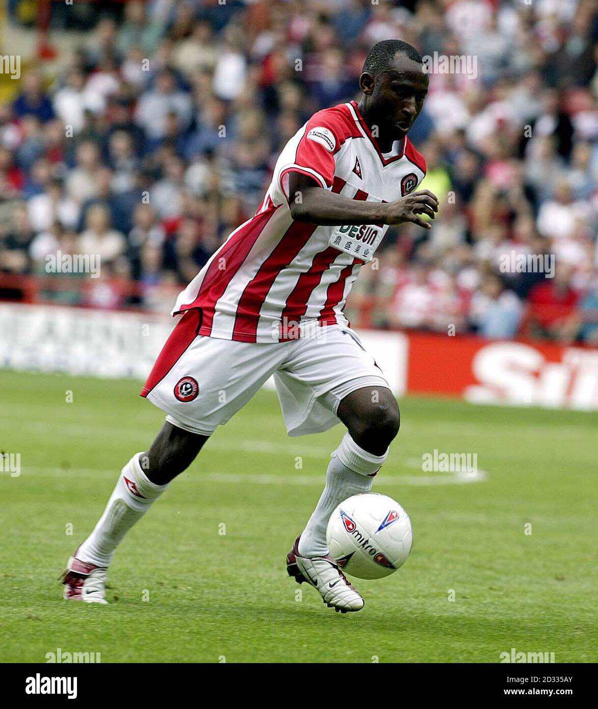 Sport football action peter ndlovu hi-res stock photography and images ...
