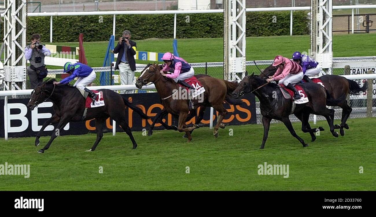 Master Robbie (left), ridden by Ryan Moore, on the way to victory in ...