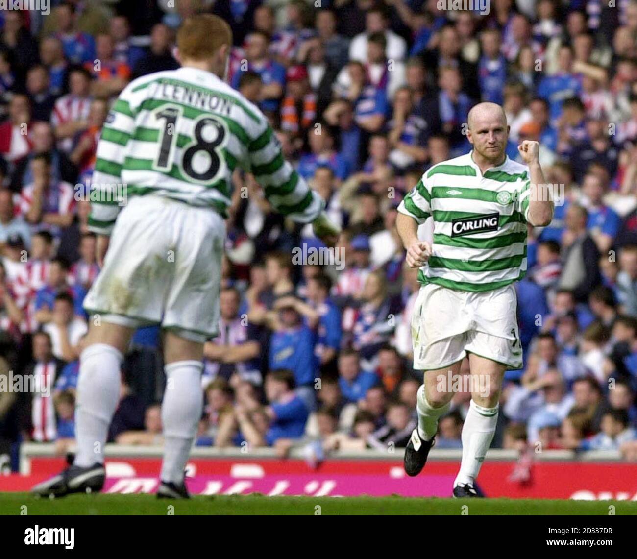 EDITORIAL USE ONLY: Celtic's John Hartson (right) celebrates after ...
